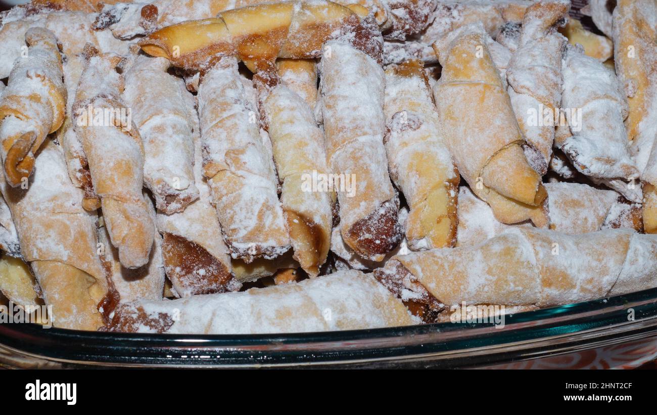 Crispy croissants stuffed with jam. traditional slavic pastry called ...