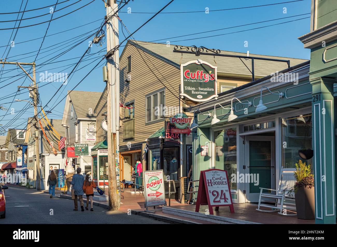 people enjoy a warm summer day in the historic part of Provincetown ...