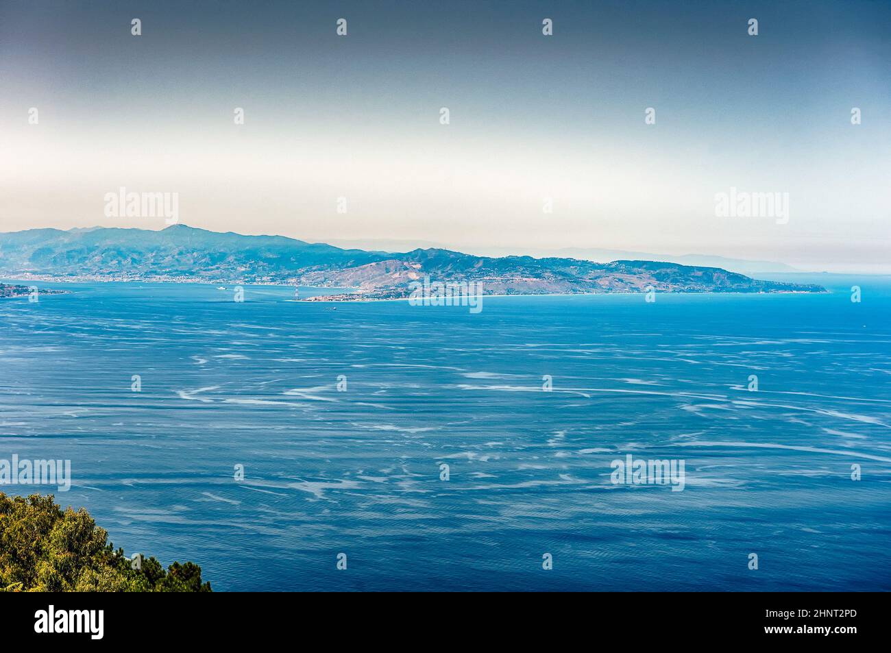 Scenic aerial view of the Strait of Messina, between the eastern tip of ...