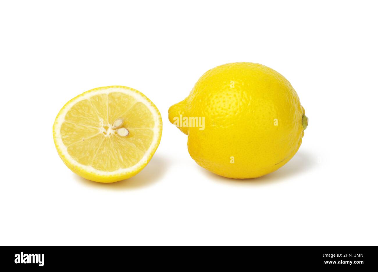 round yellow lemon isolated on white background Stock Photo - Alamy
