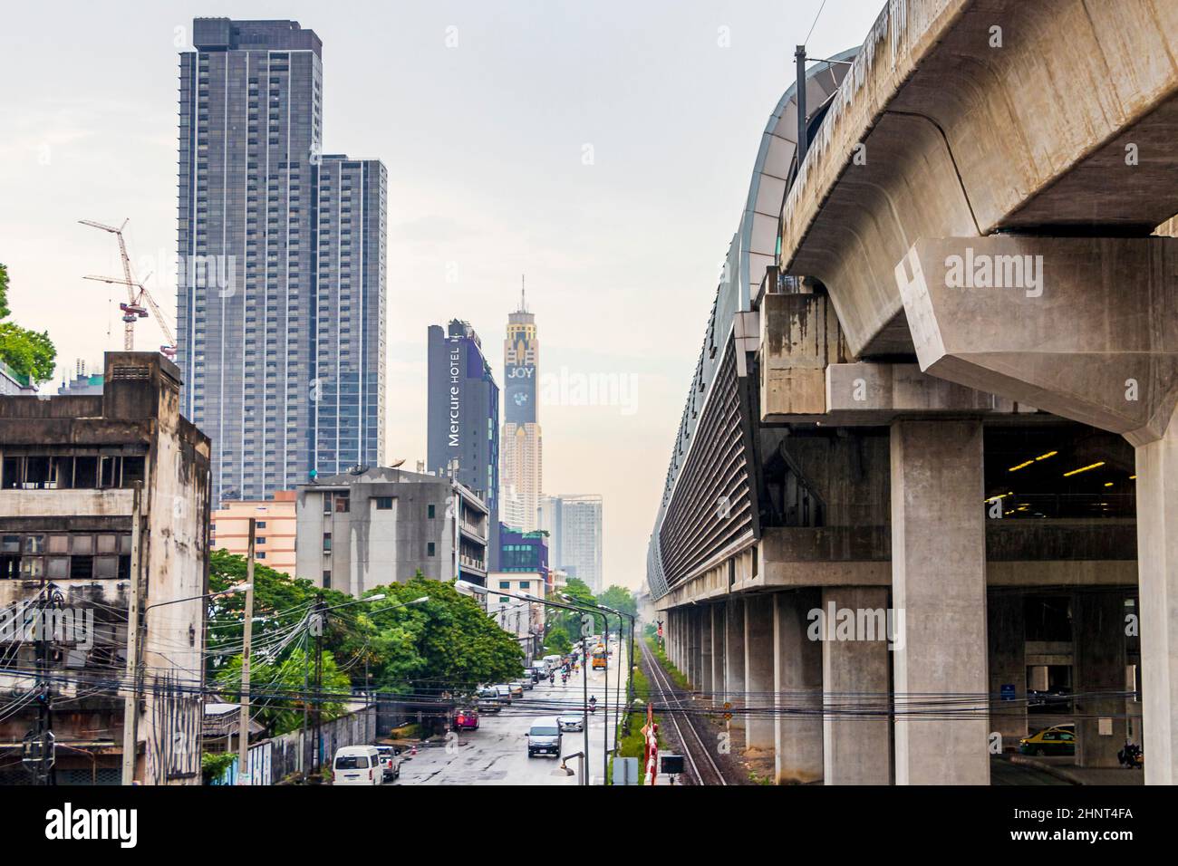 Cityscape traffic and rain at Makkasan station in Bangkok Thailand ...