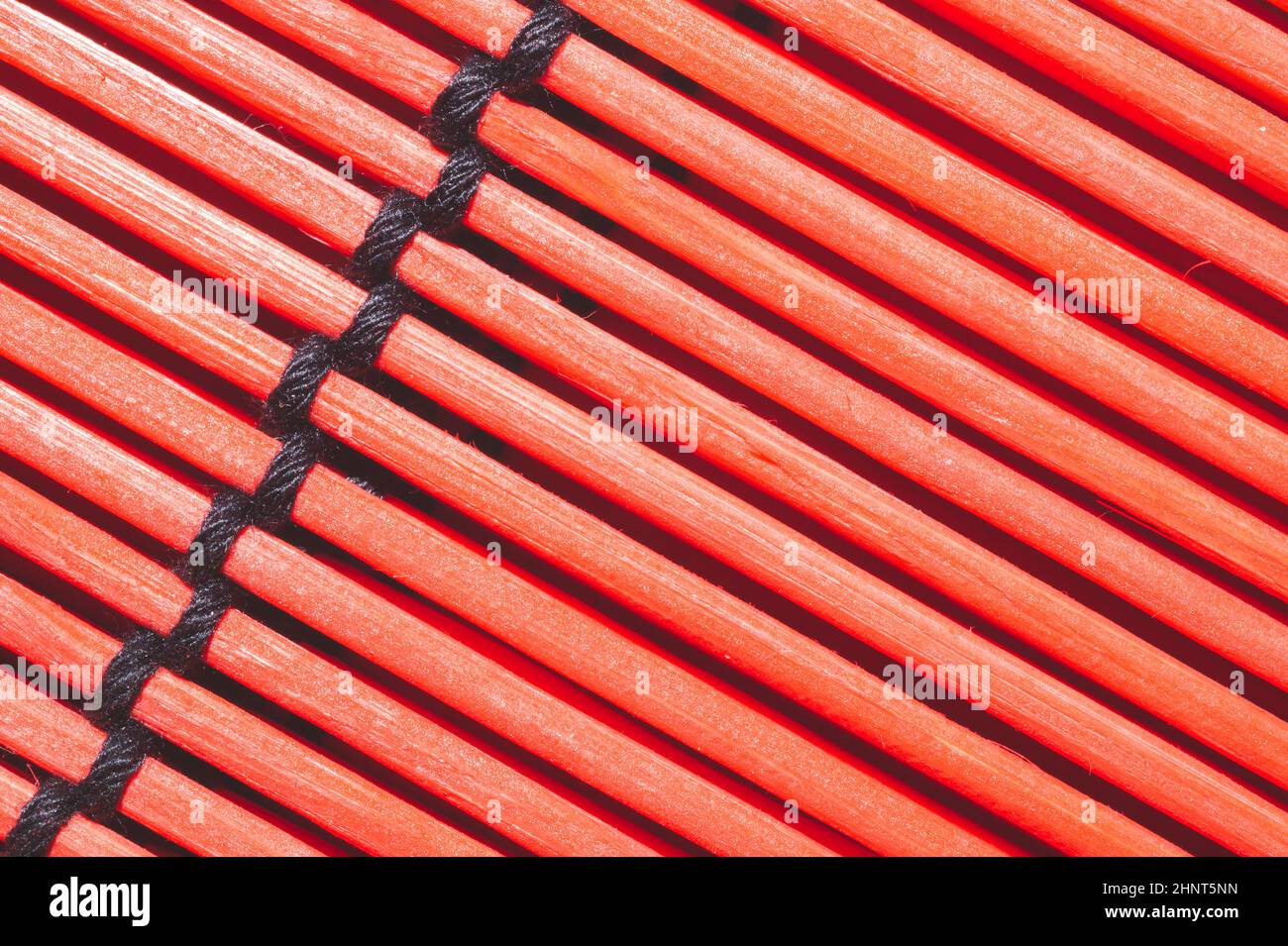 Bamboo mat background close up. wooden backdrop. red wooden sticks ...