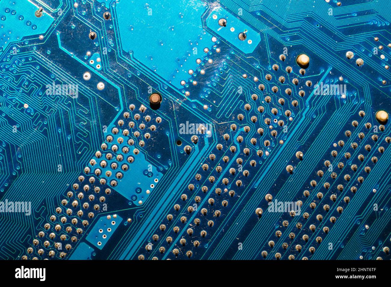 Dusty circuit board abstract background. computer motherboard close up. modern technologies ...