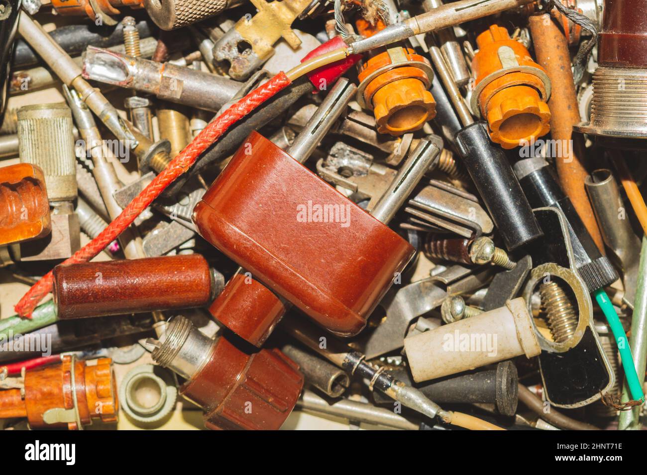 Pile of fasteners and screws close up. scrap metal. different metal ...