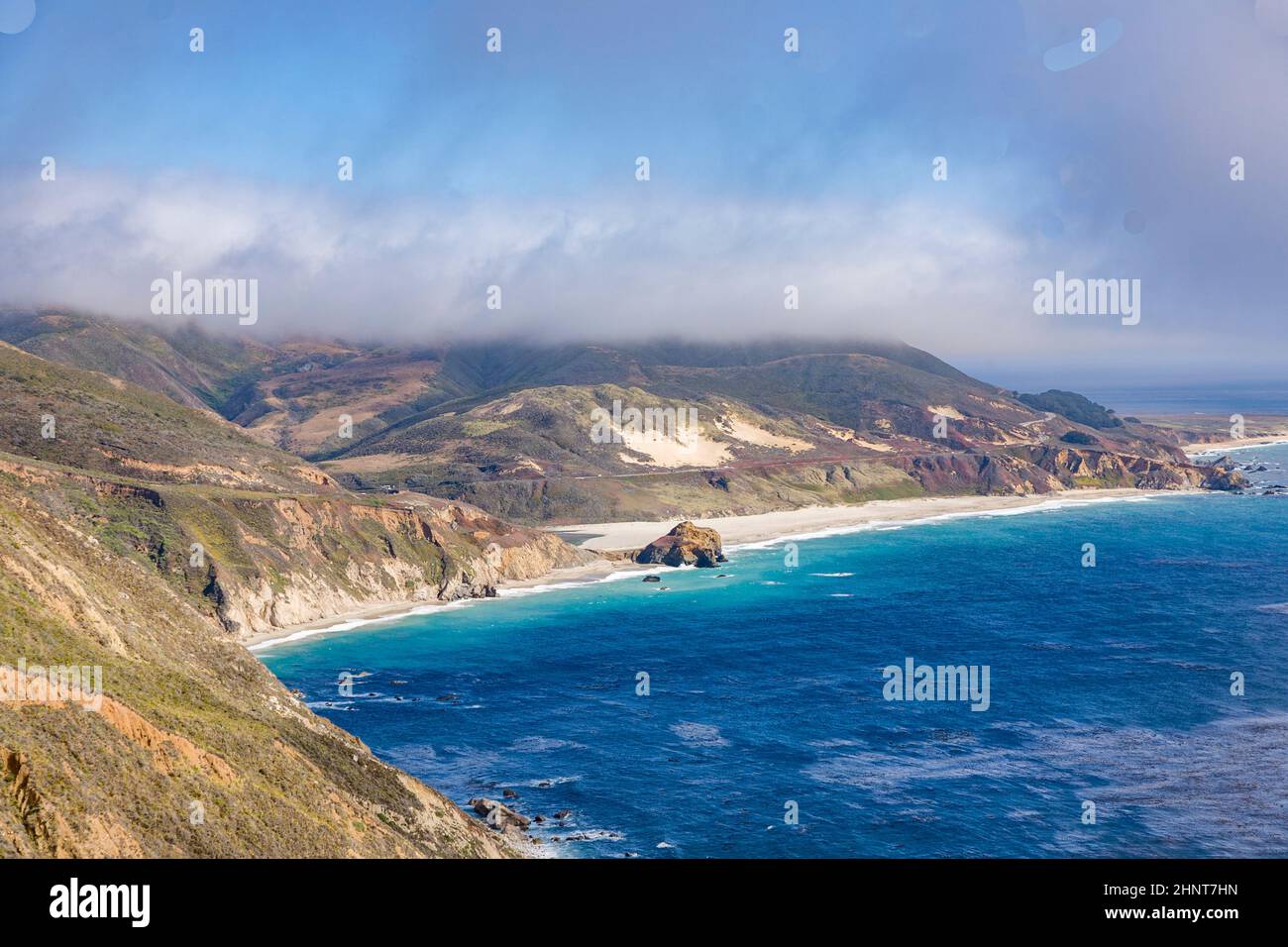 coast in big sur with Point Sur Light at horizon, USA Stock Photo - Alamy