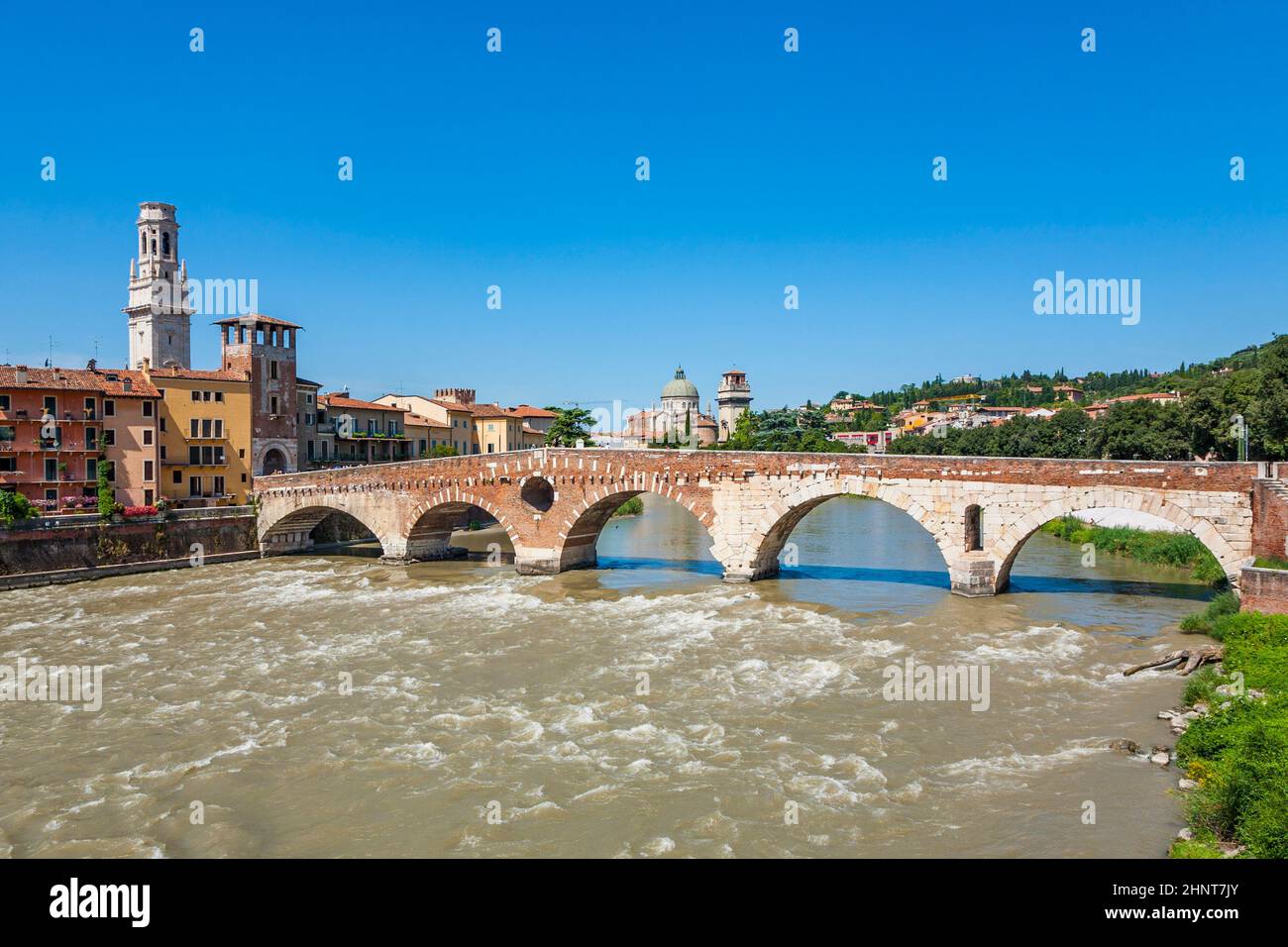 the old roman bridge in Verona spans the river Etsch, Italy Stock Photo ...