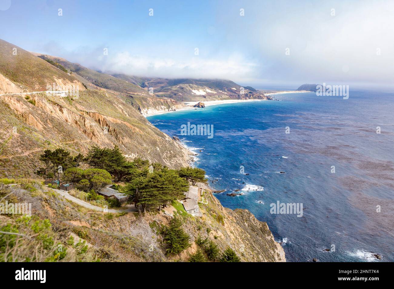coast in big sur with Point Sur Light at horizon, USA Stock Photo - Alamy