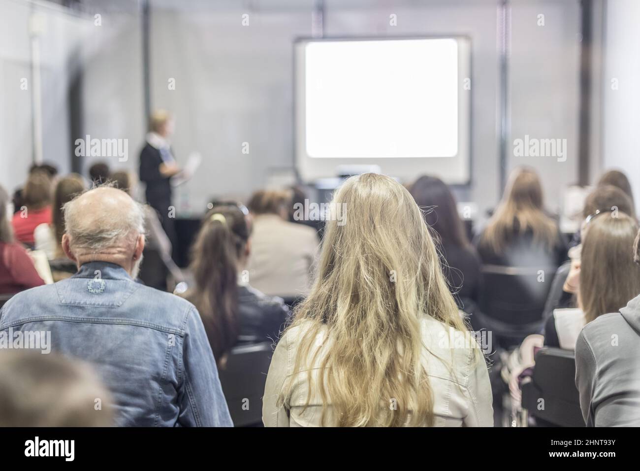 Woman giving presentation on business conference event Stock Photo - Alamy