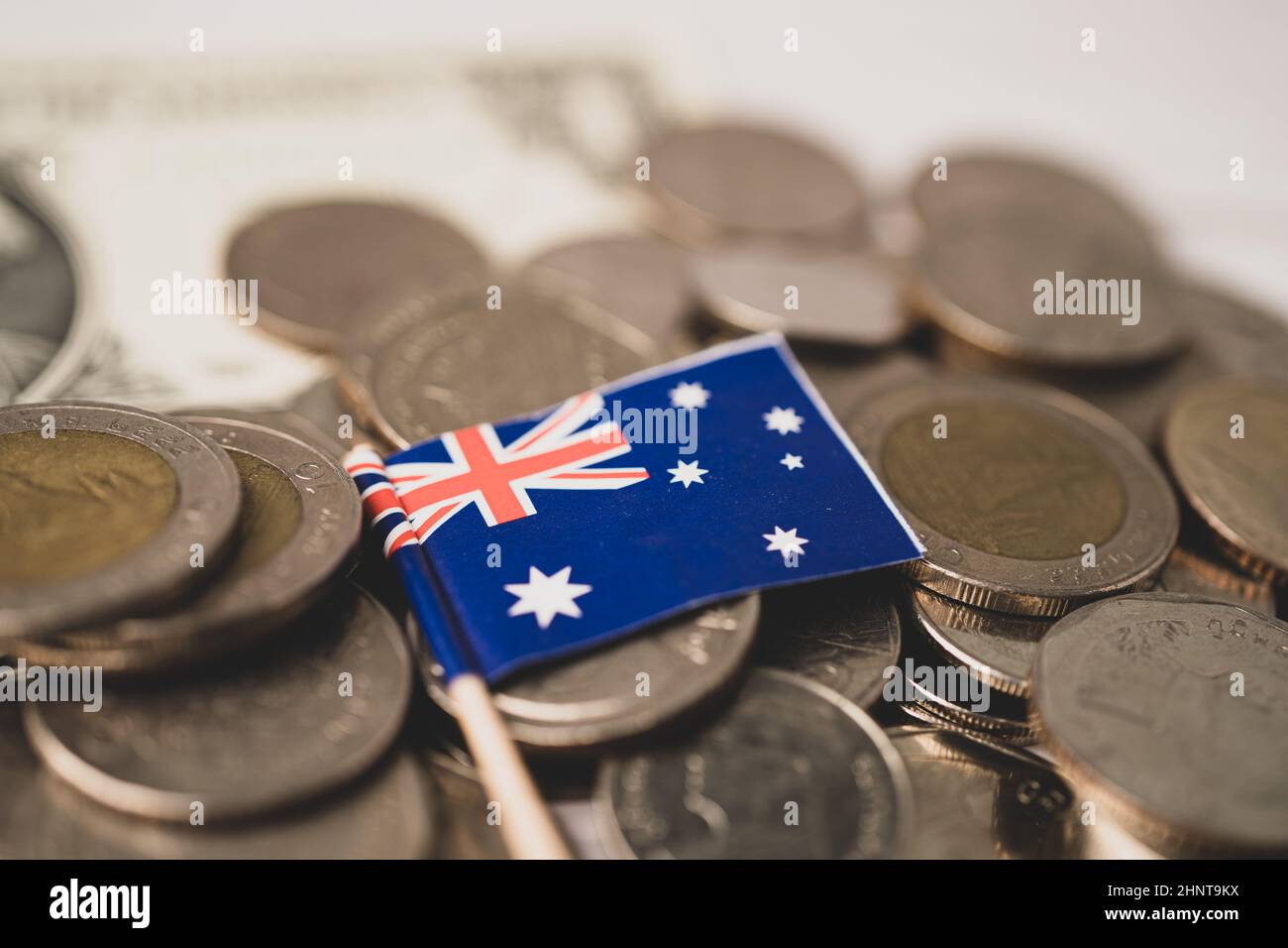 Australia flag on coins background, finance and accounting, banking ...