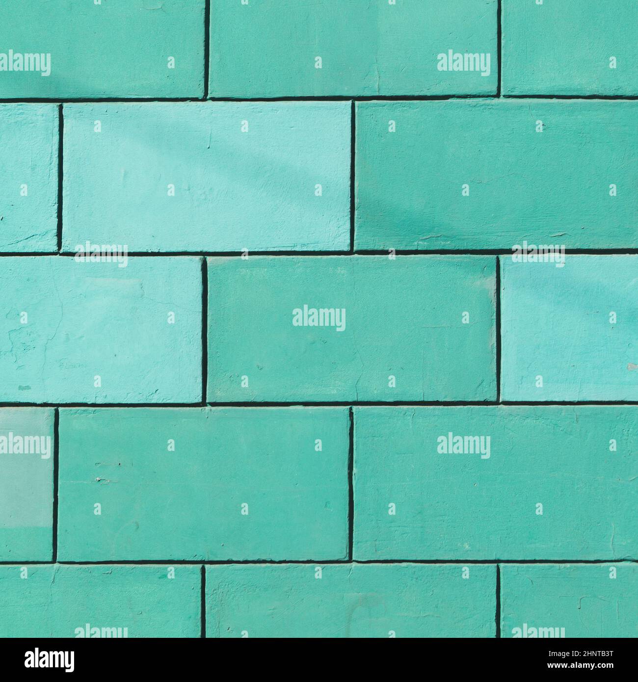Brick wall is painted mint green color. stone background Stock Photo ...