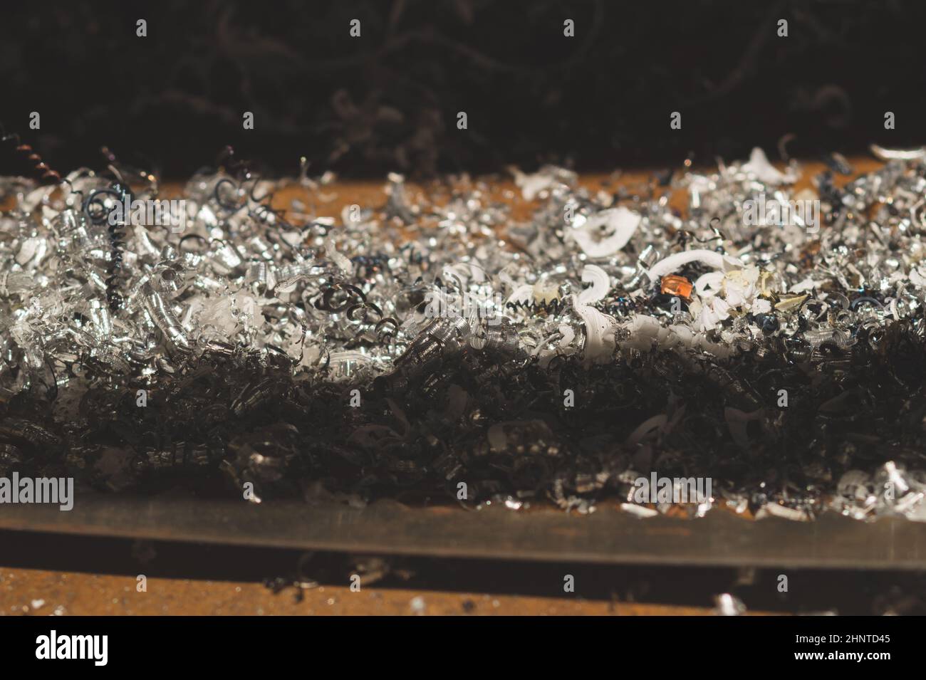 Twisted spiral steel shavings close up. drilling and lathe industry ...