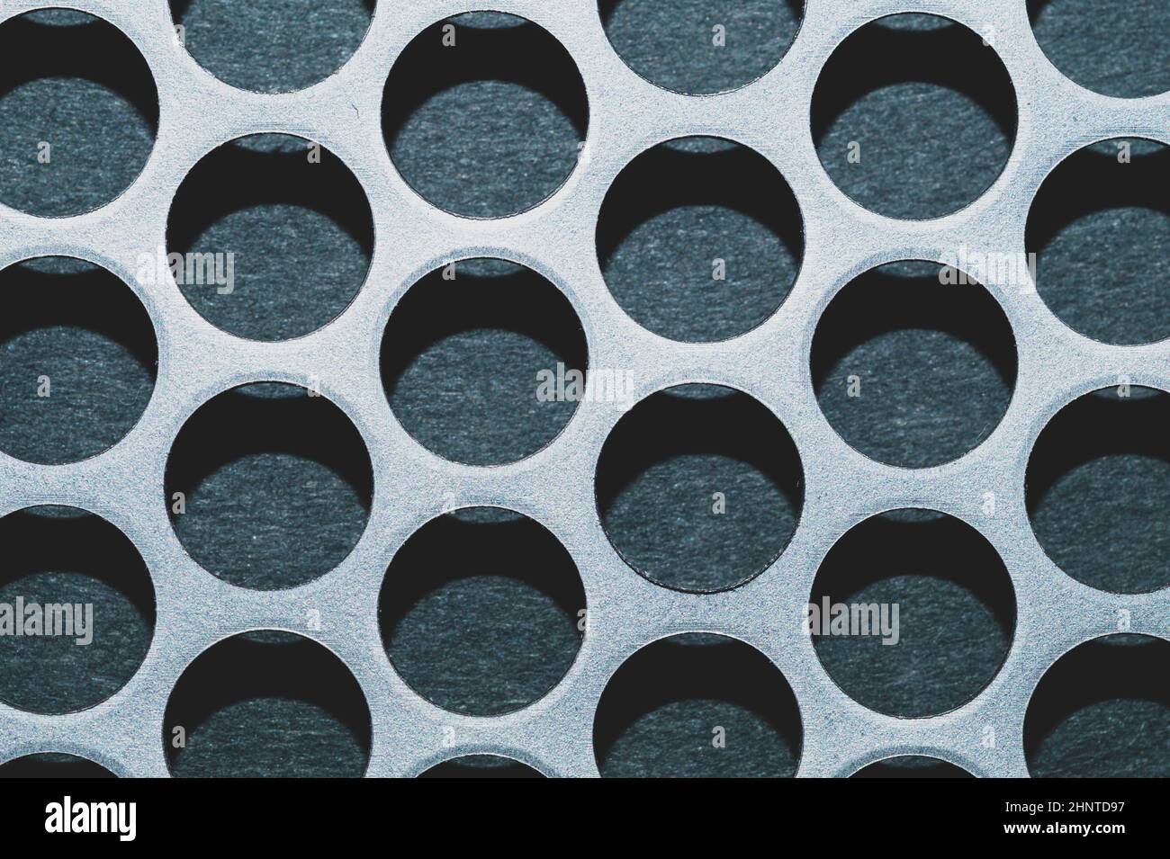 Steel plate with holes. metal grid with round cells. modern background ...
