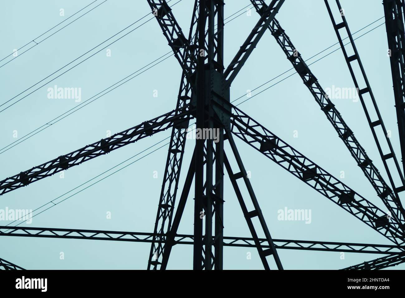 Detail of power line post. high voltage tower with the sky. industrial ...