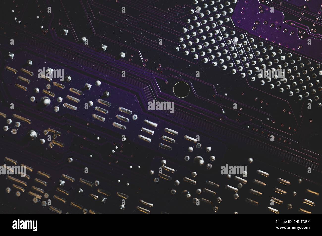 Processor pins macro. computer motherboard close up. cpu pins on a circuit board. micro elements ...