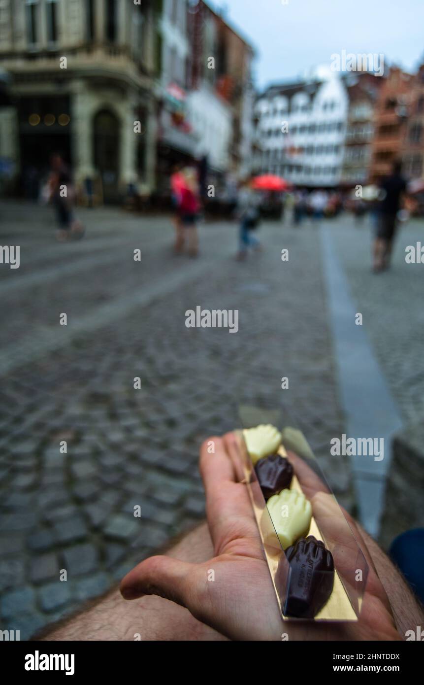 ANTWERP, BELGIUM - AUGUST 22, 2013: Typical hand-shaped chocolate in ...