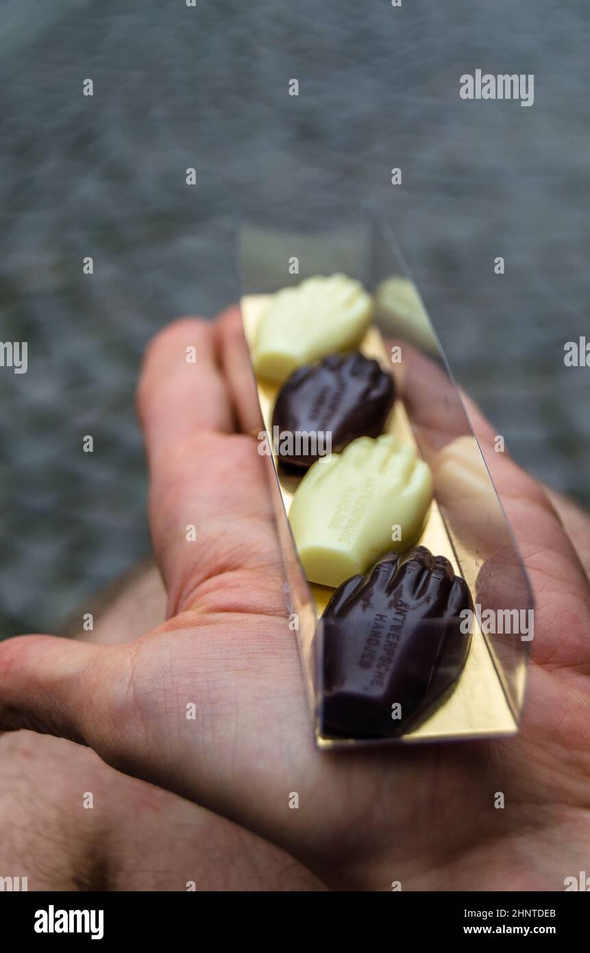 ANTWERP, BELGIUM - AUGUST 22, 2013: Typical hand-shaped chocolate in ...