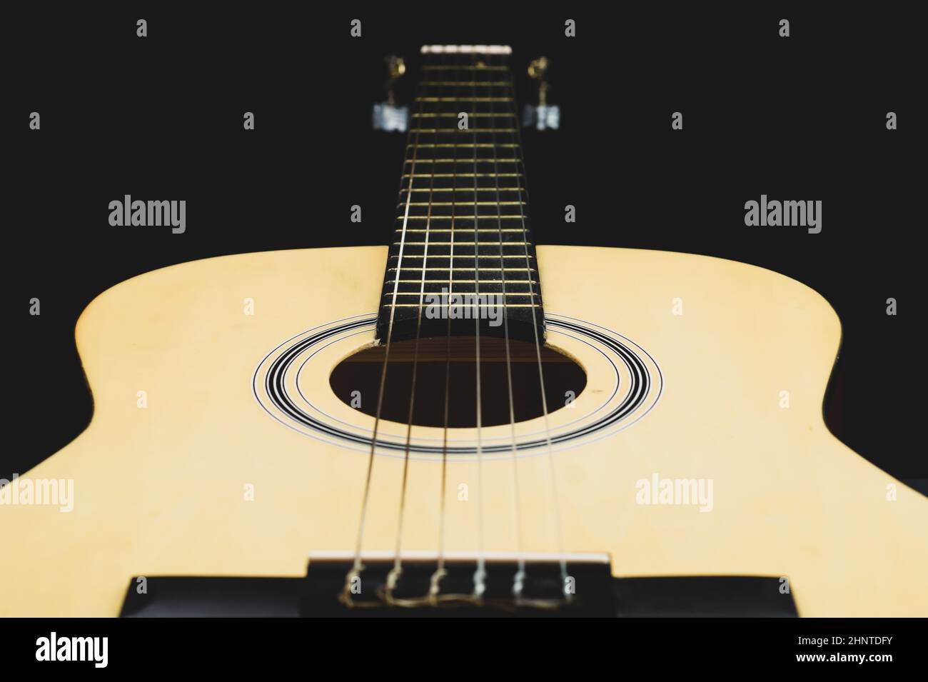 Acoustic guitar close up. musical instrument. strings on the guitar ...