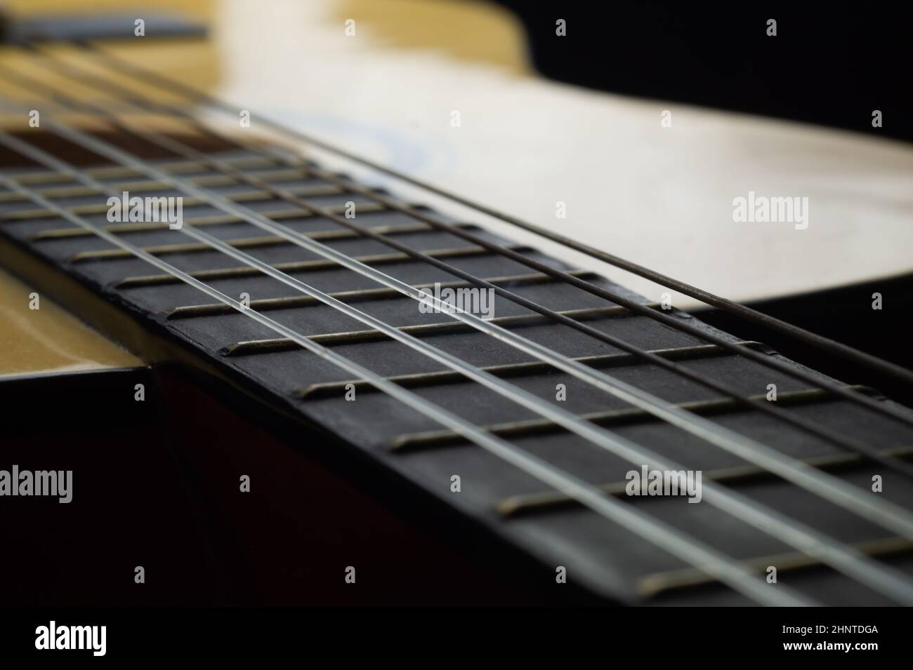 Acoustic guitar close up. musical instrument. strings on the guitar ...