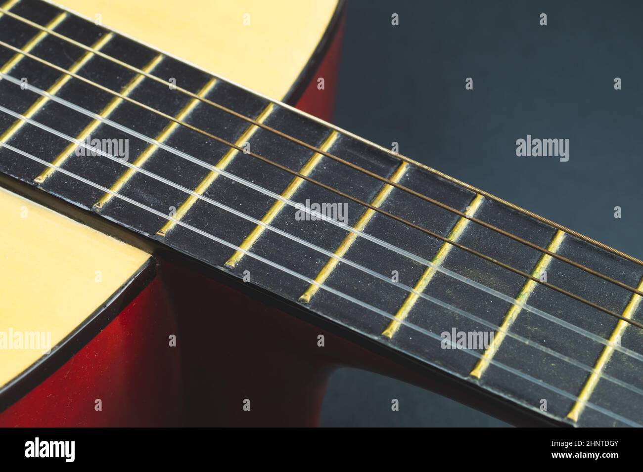 Acoustic guitar close up. musical instrument. strings on the guitar ...