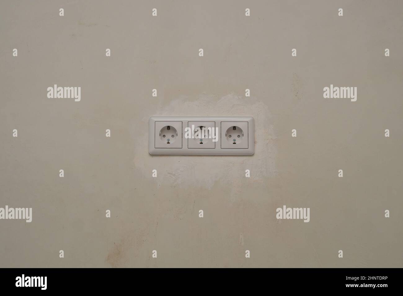 Power socket in the wall. electrical outlet close up. process of ...