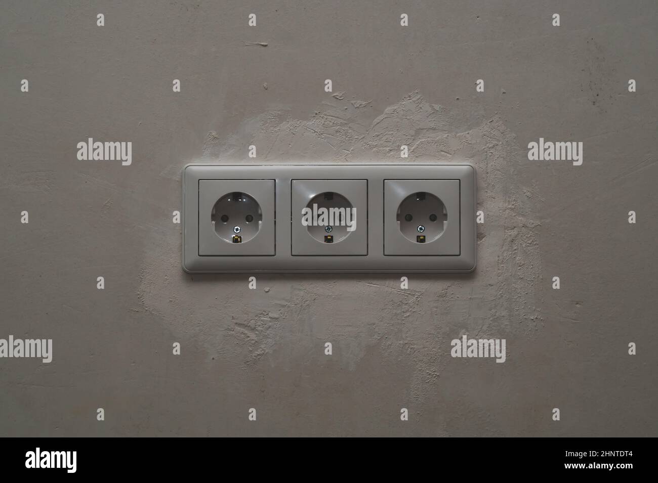 Power socket in the wall. electrical outlet close up. process of ...