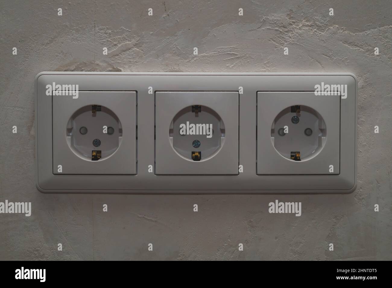Power socket in the wall. electrical outlet close up. process of ...