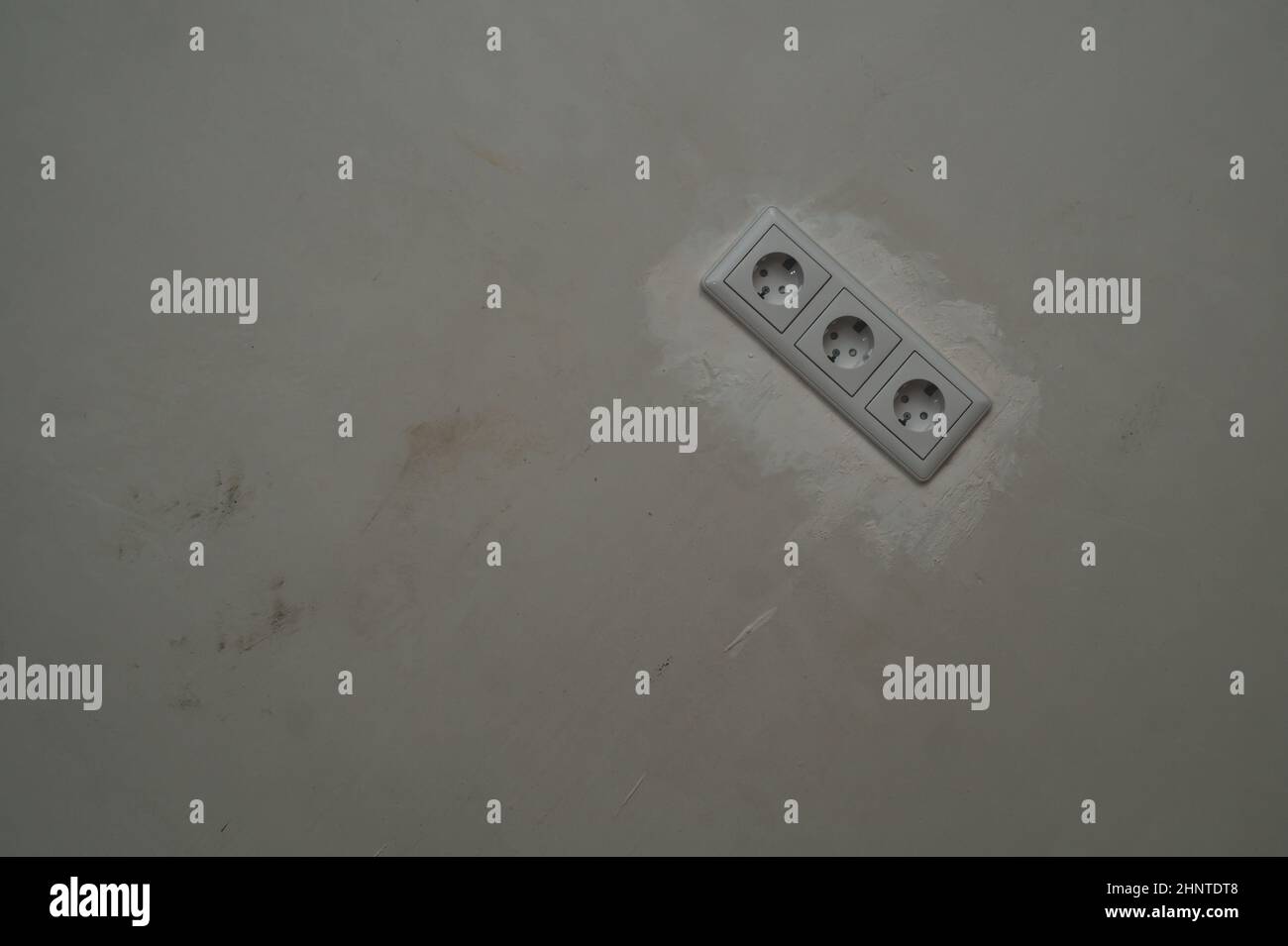 Power socket in the wall. electrical outlet close up. process of ...