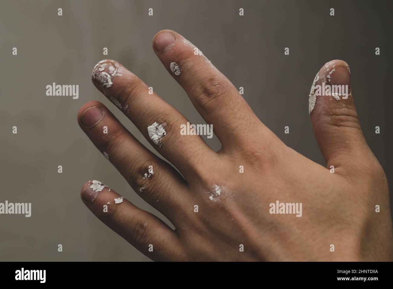 Paint on hand of workman close up. renovation process Stock Photo - Alamy