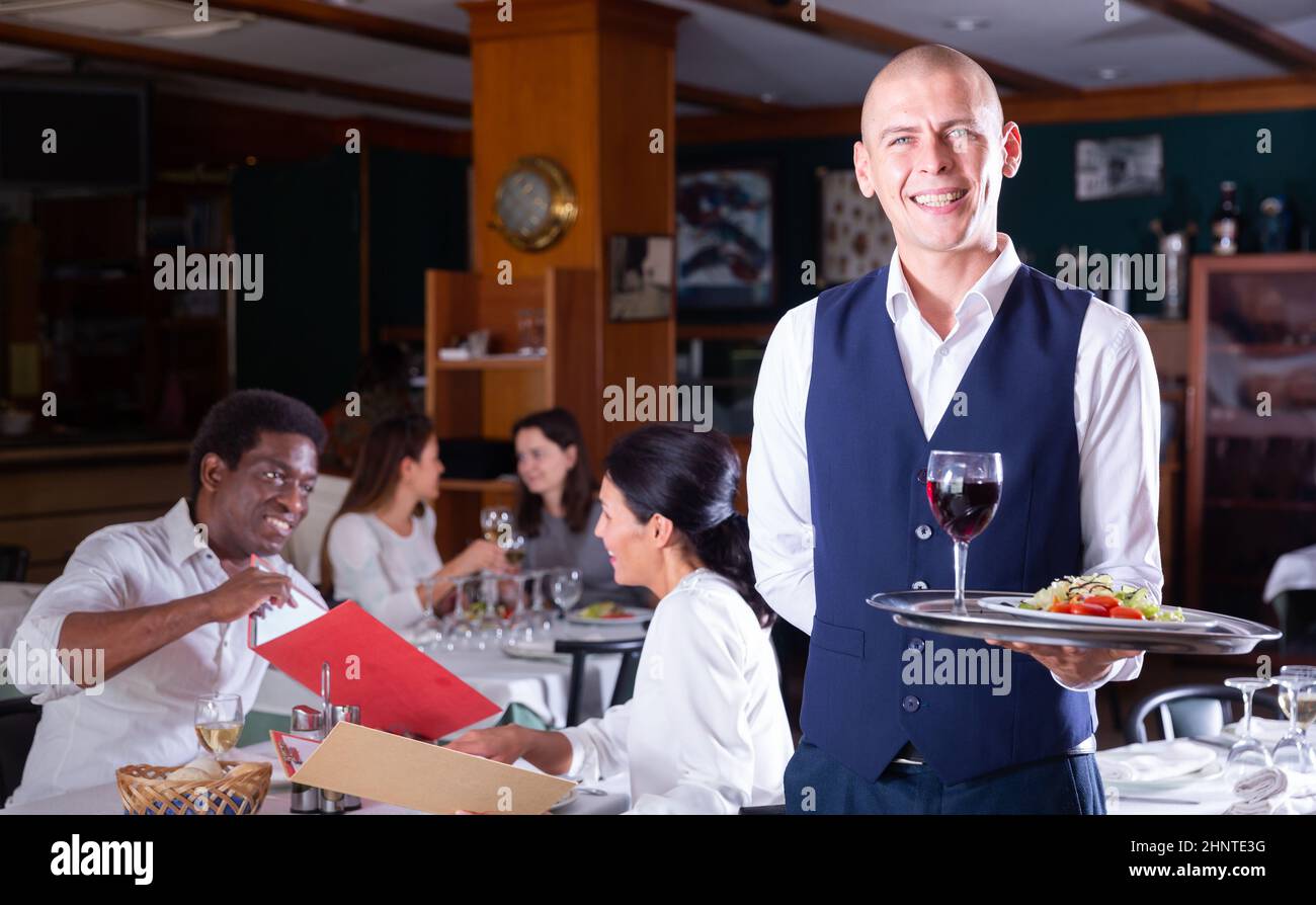 Italian waiter wine interior hi-res stock photography and images - Alamy