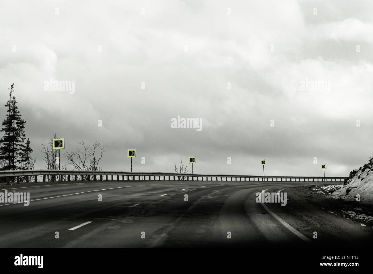 Roadway turn with road signs. highway background Stock Photo - Alamy