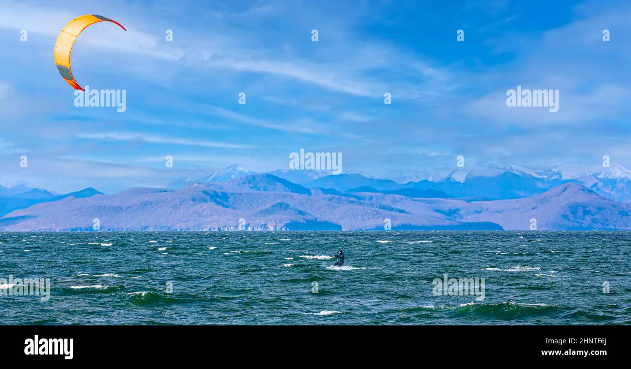The Kitesurfing on the waves in the Pacific Ocean off the coast of the ...