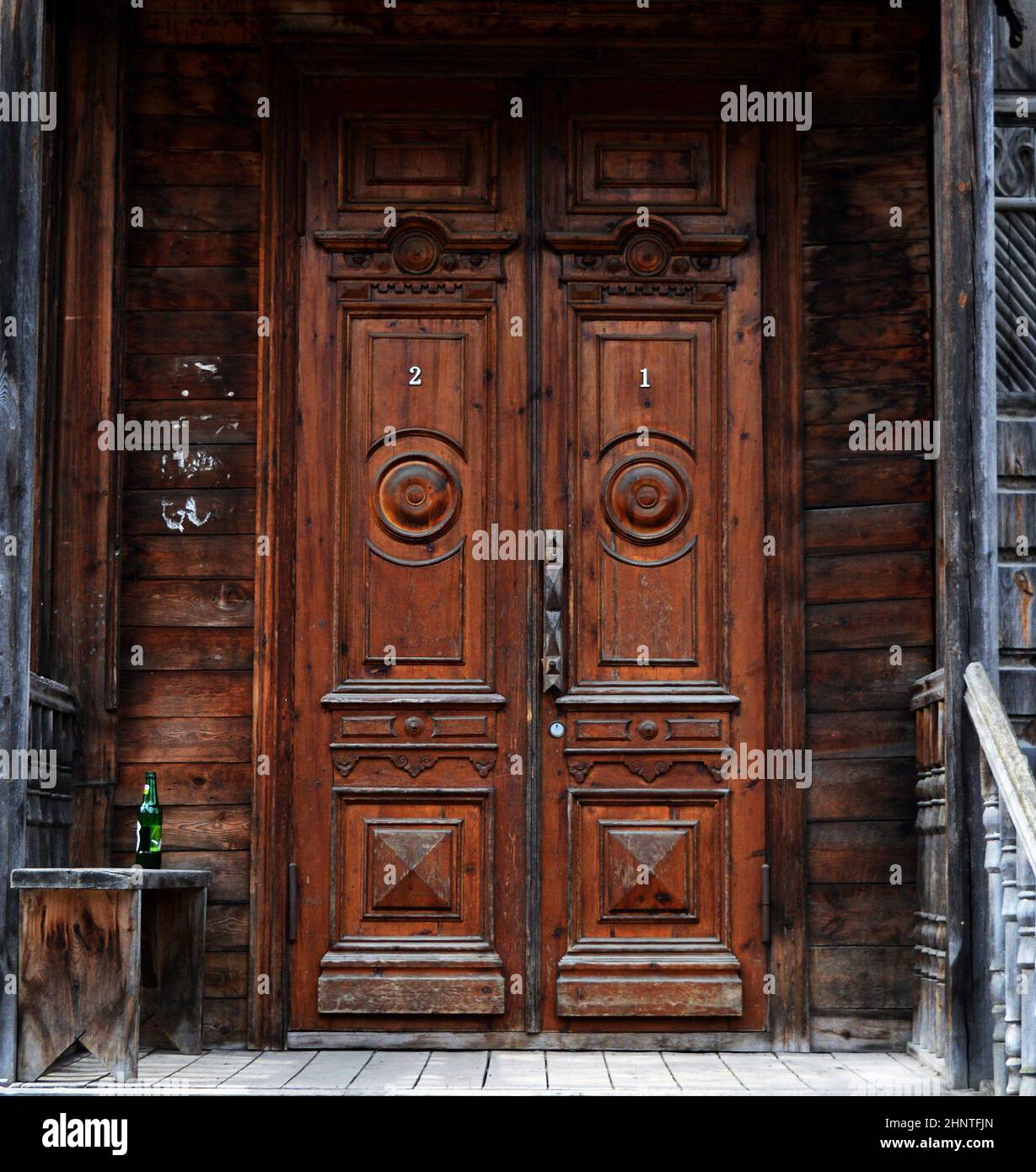 1st of May 2016, Russia, Tomsk, wooden door of restored wooden house ...
