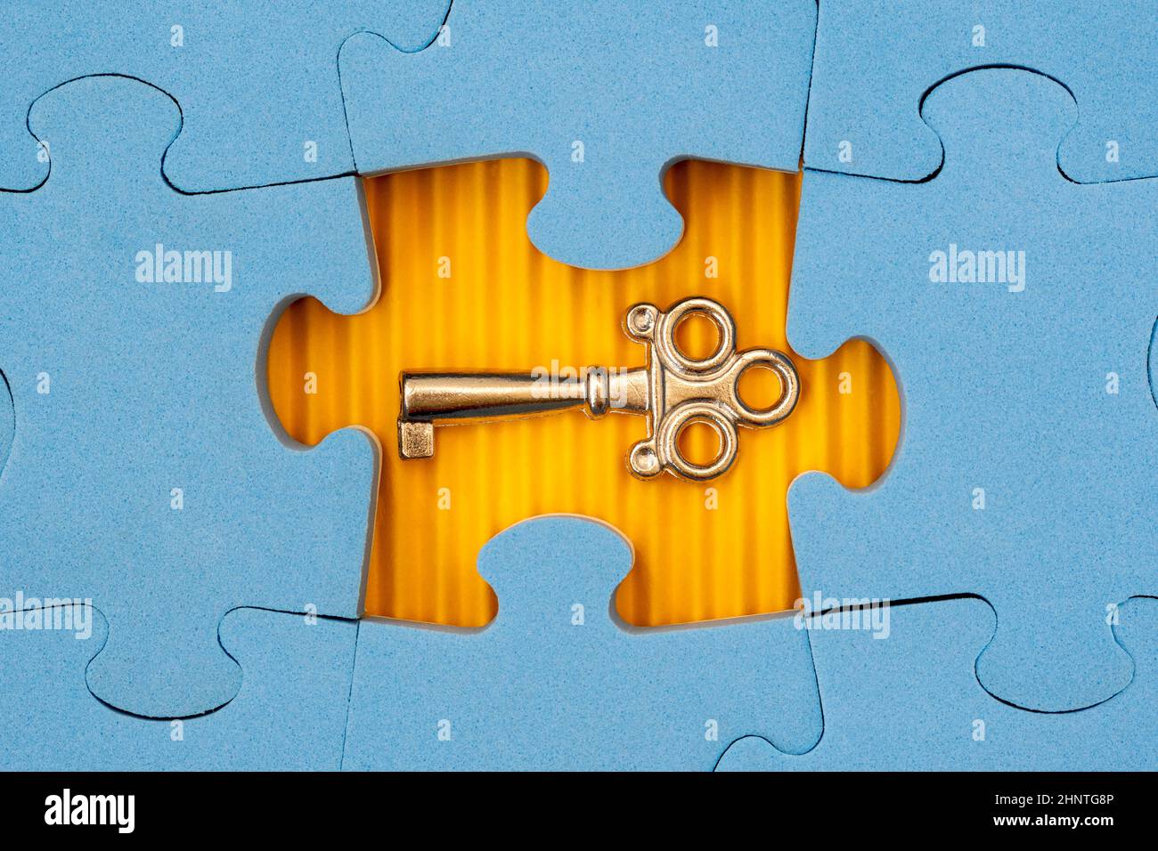 Find key to success, business opportunity or solution. Blue jigsaw ...