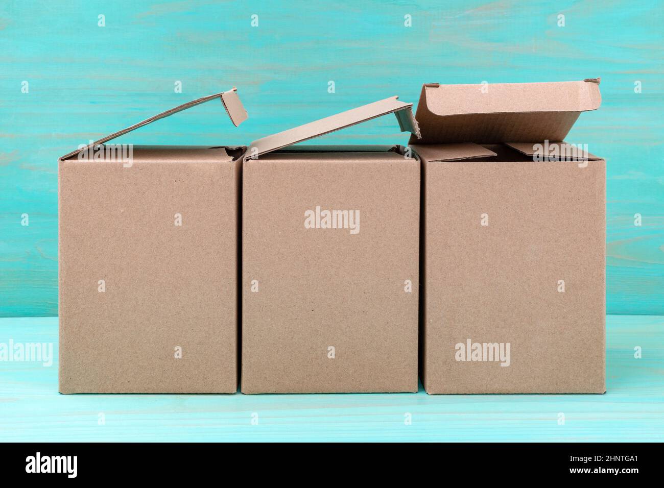 Three open shipping boxes hi-res stock photography and images - Alamy