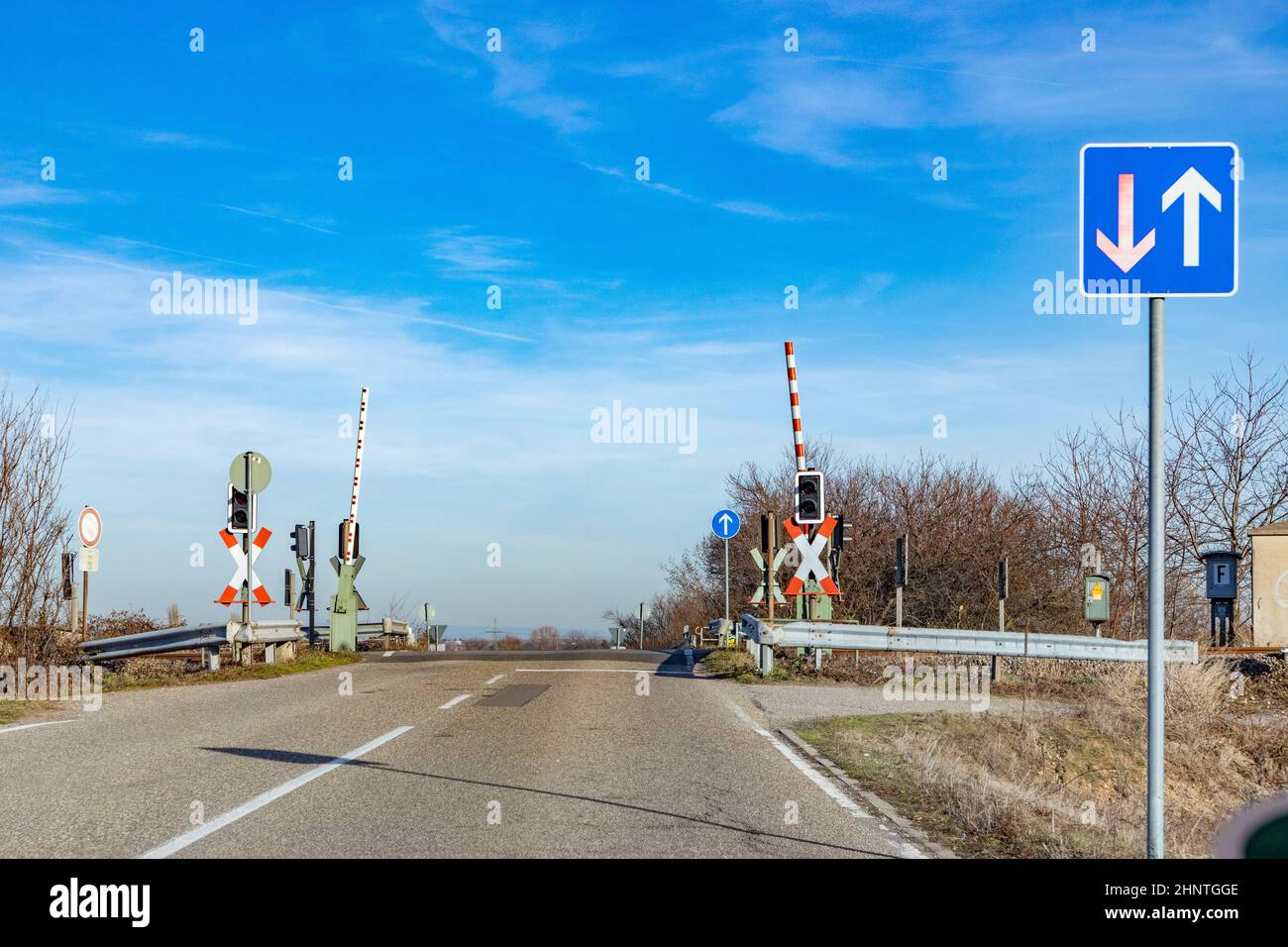 open railway crossing with barriere and traffic light in Germany Stock ...