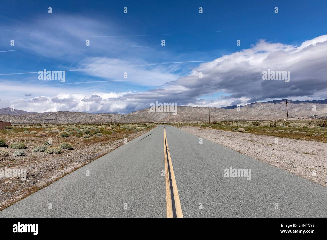 driving on a bumpy old small road in the desert Stock Photo - Alamy