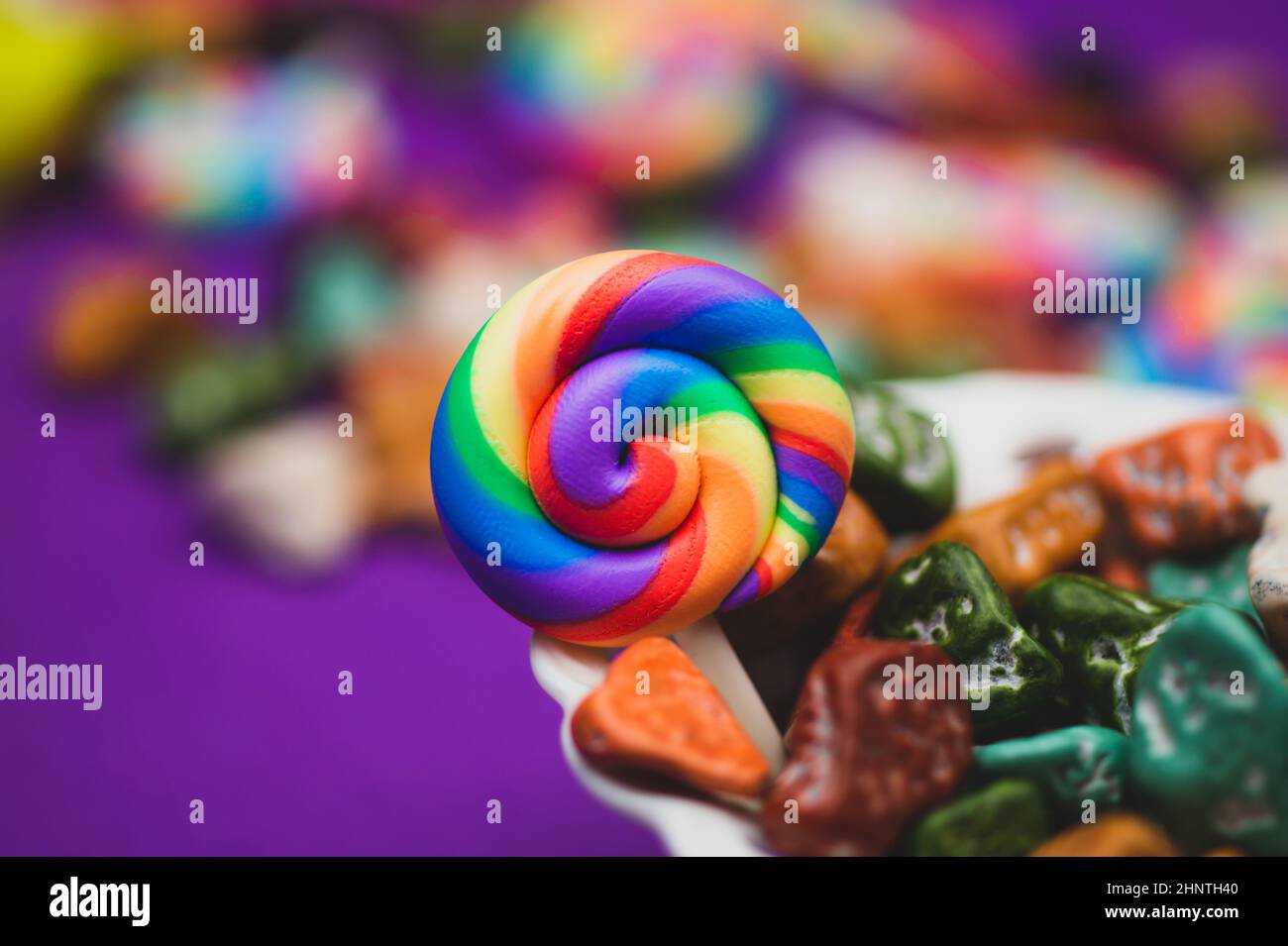 Lollipops and candy pebbles. sweets in the form of colored stones ...