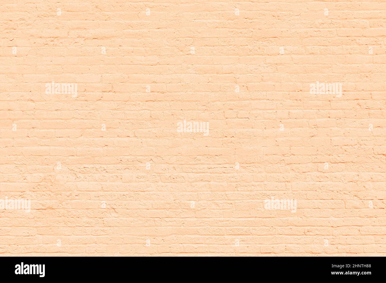 harmonic old brick wall painted in ocre as background Stock Photo - Alamy