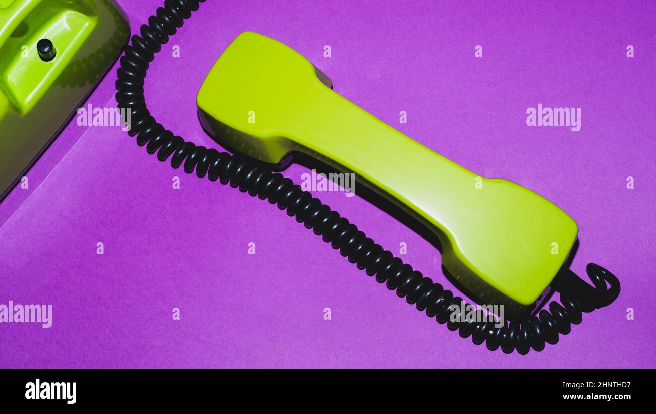 Telephone handset. phone receiver on purple background. old ...
