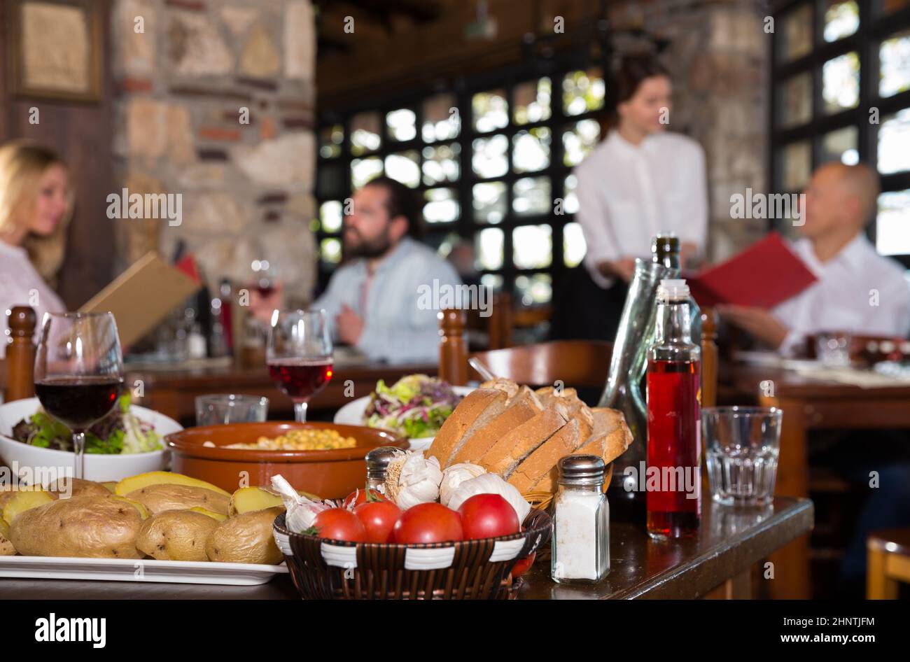 Served table with food in the restaurant in anticipation of guests ...