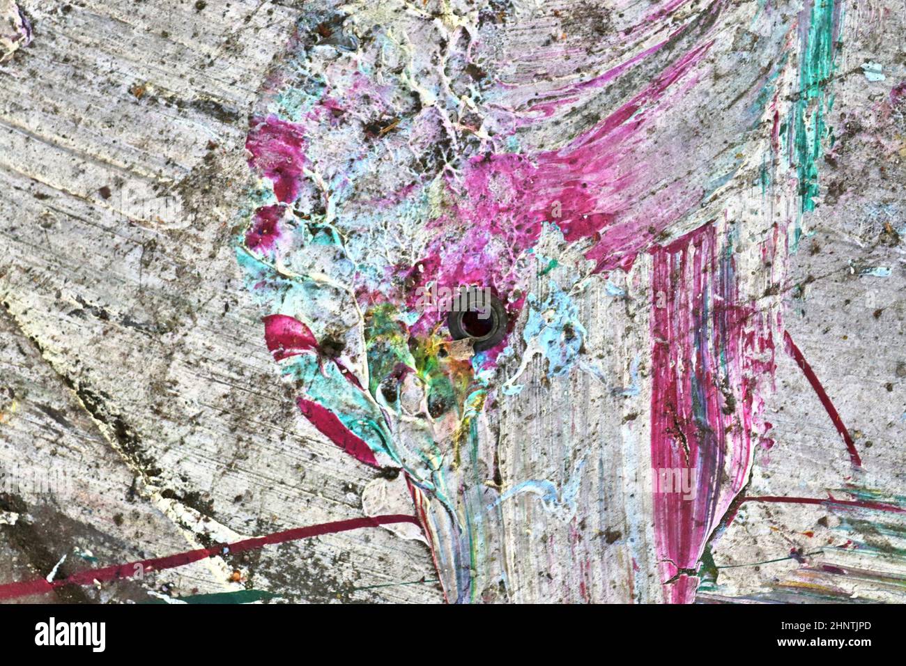 Colorful graffiti paint splashes on the wall and ground at a lost place ...
