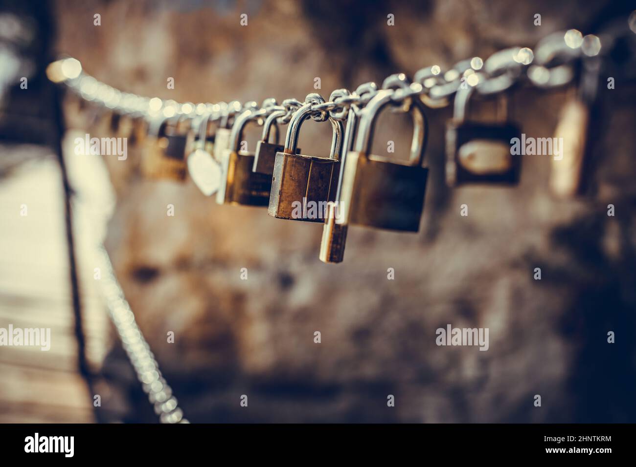 Padlocks on a chain hi-res stock photography and images - Alamy