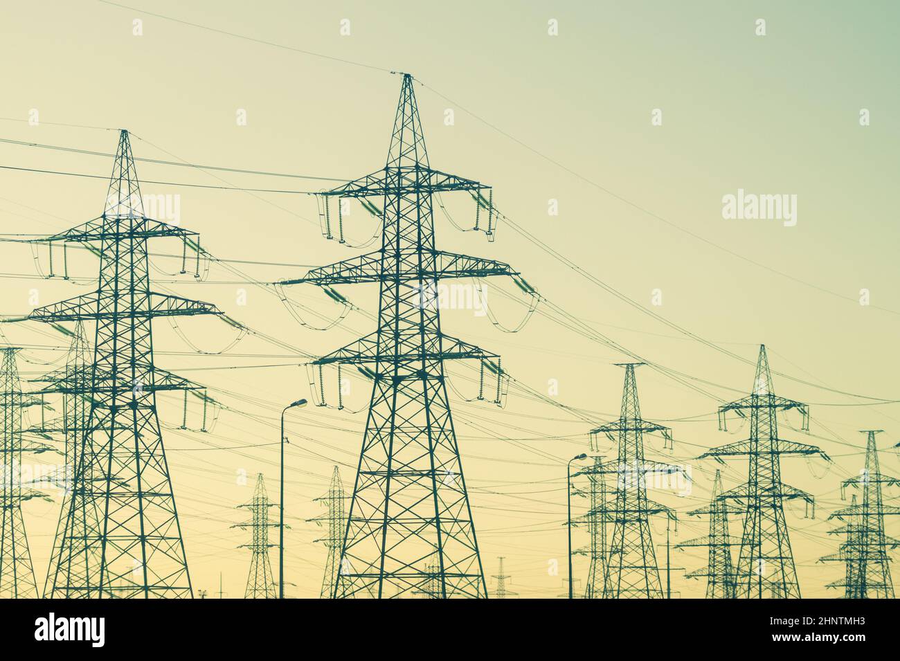 Power line posts. high voltage tower with the sky. industrial ...