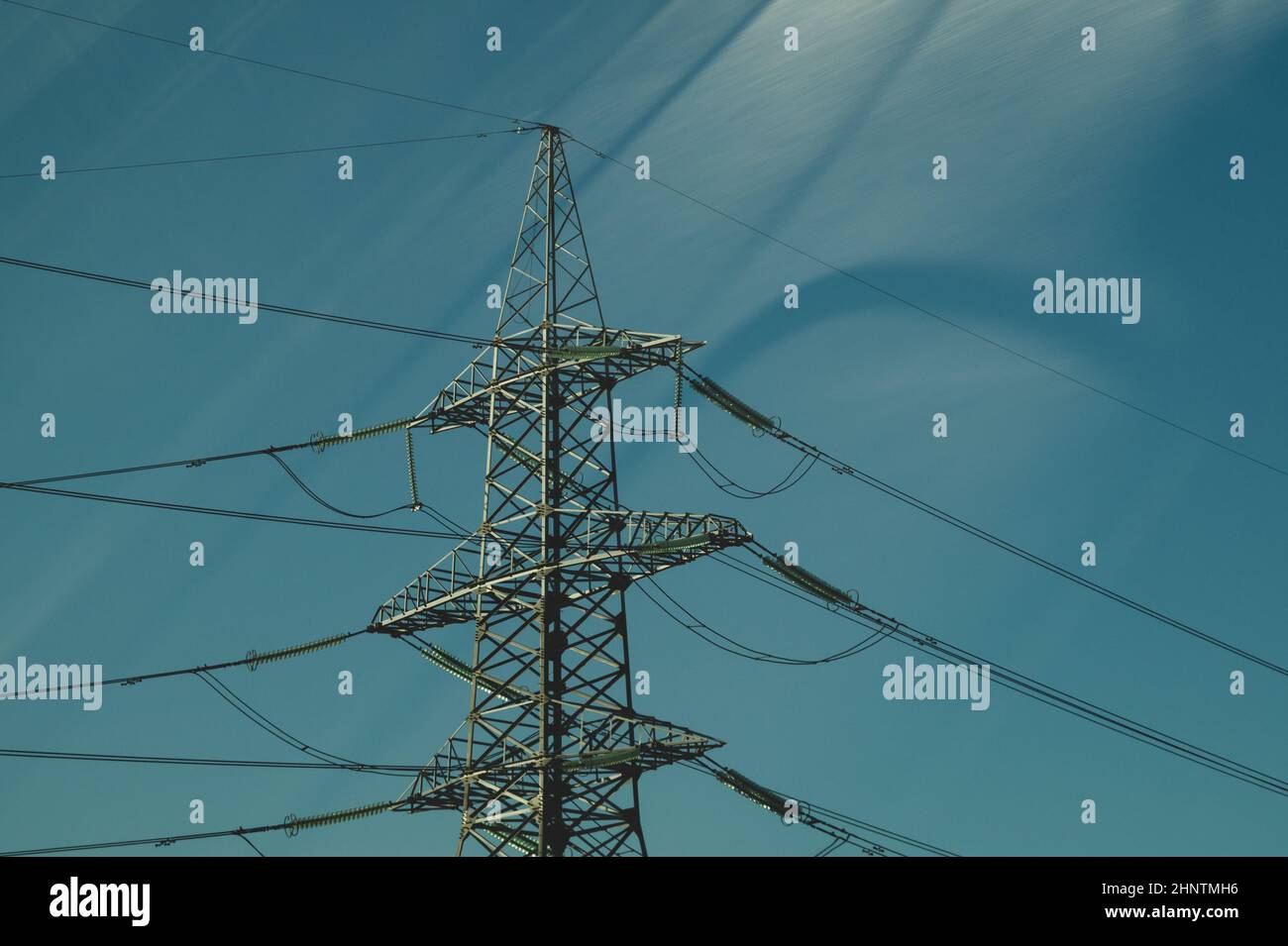 Power line post. high voltage tower with the sky. industrial background ...