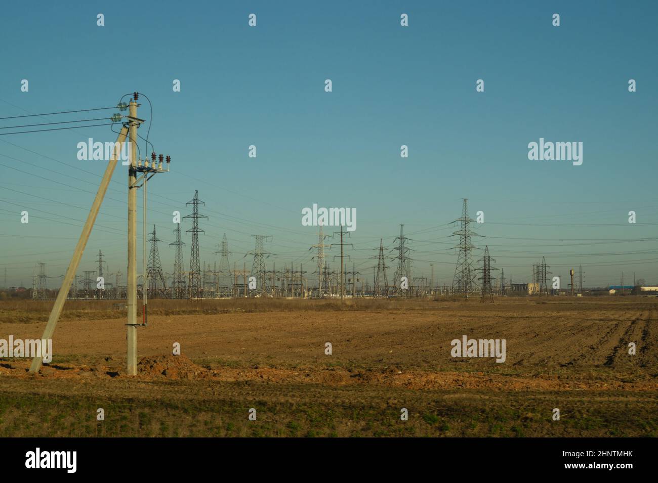 Power line posts. high voltage tower with the sky. industrial ...