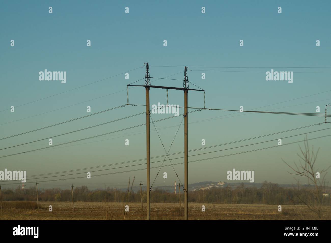 Power line posts. high voltage tower with the sky. industrial ...