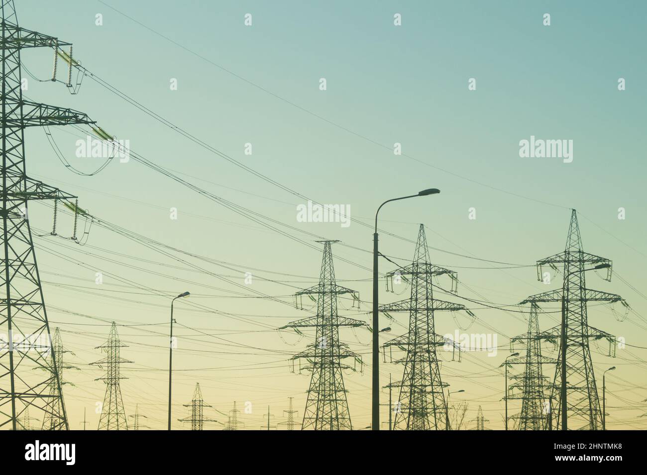 Power line posts. high voltage tower with the sky. industrial ...