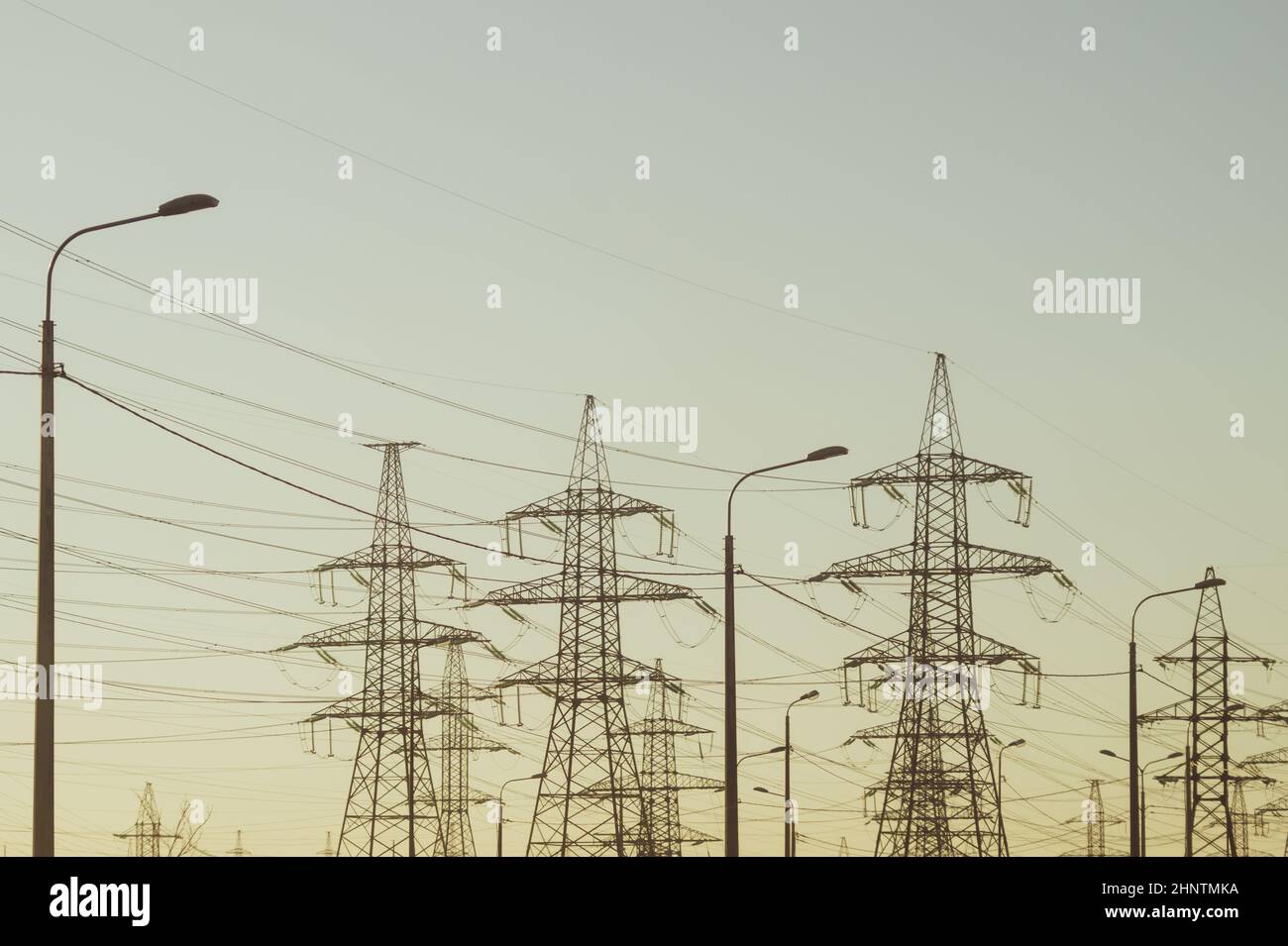 Power line posts. high voltage tower with the sky. industrial ...
