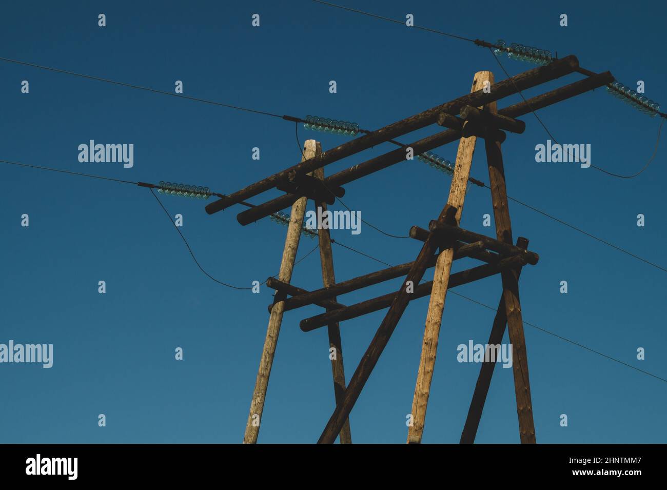 Power line post. high voltage tower with the sky. industrial background ...