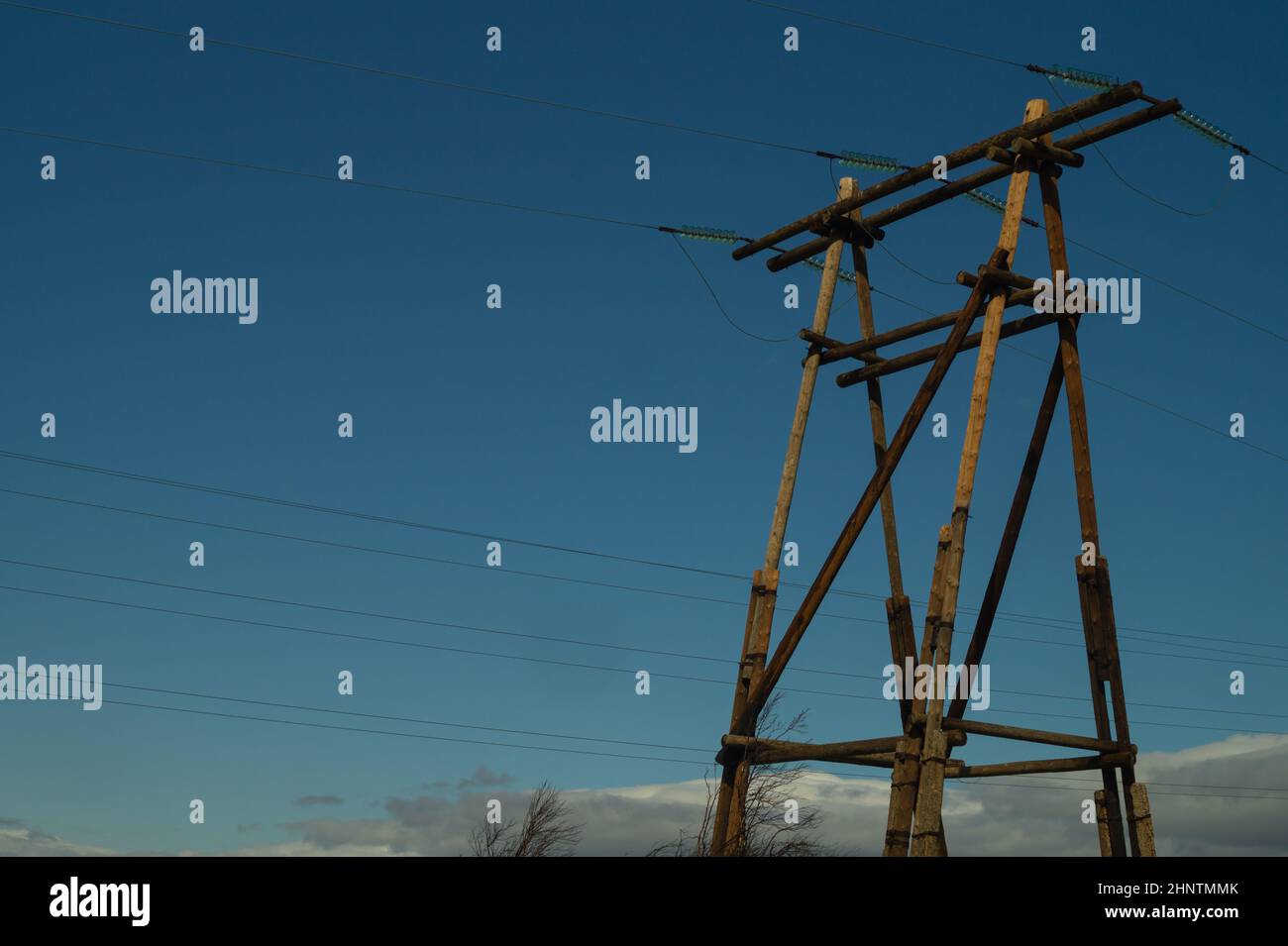 Power line post. high voltage tower with the sky. industrial background ...